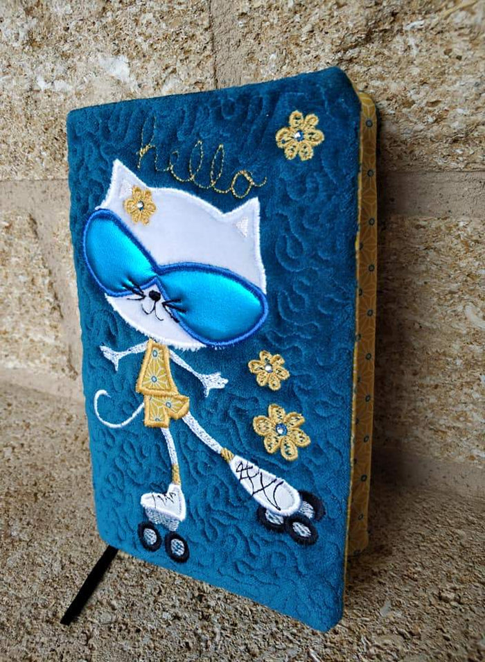 Cat Skating book cover in the hoop machine embroidery design ITH